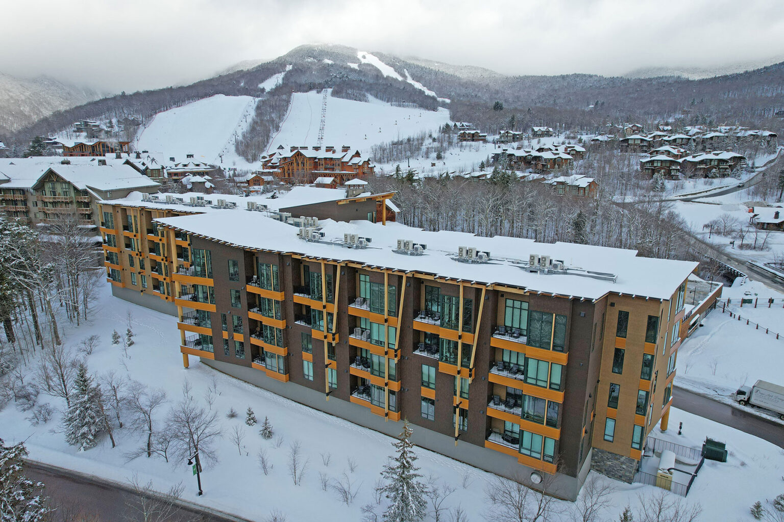 The Treehouse and Parking Garage at Spruce Peak - PC Construction